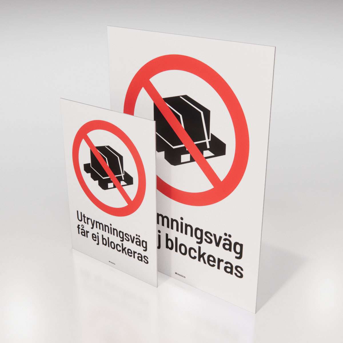 Förbudsskylt - Utrymningsväg får ej blockeras